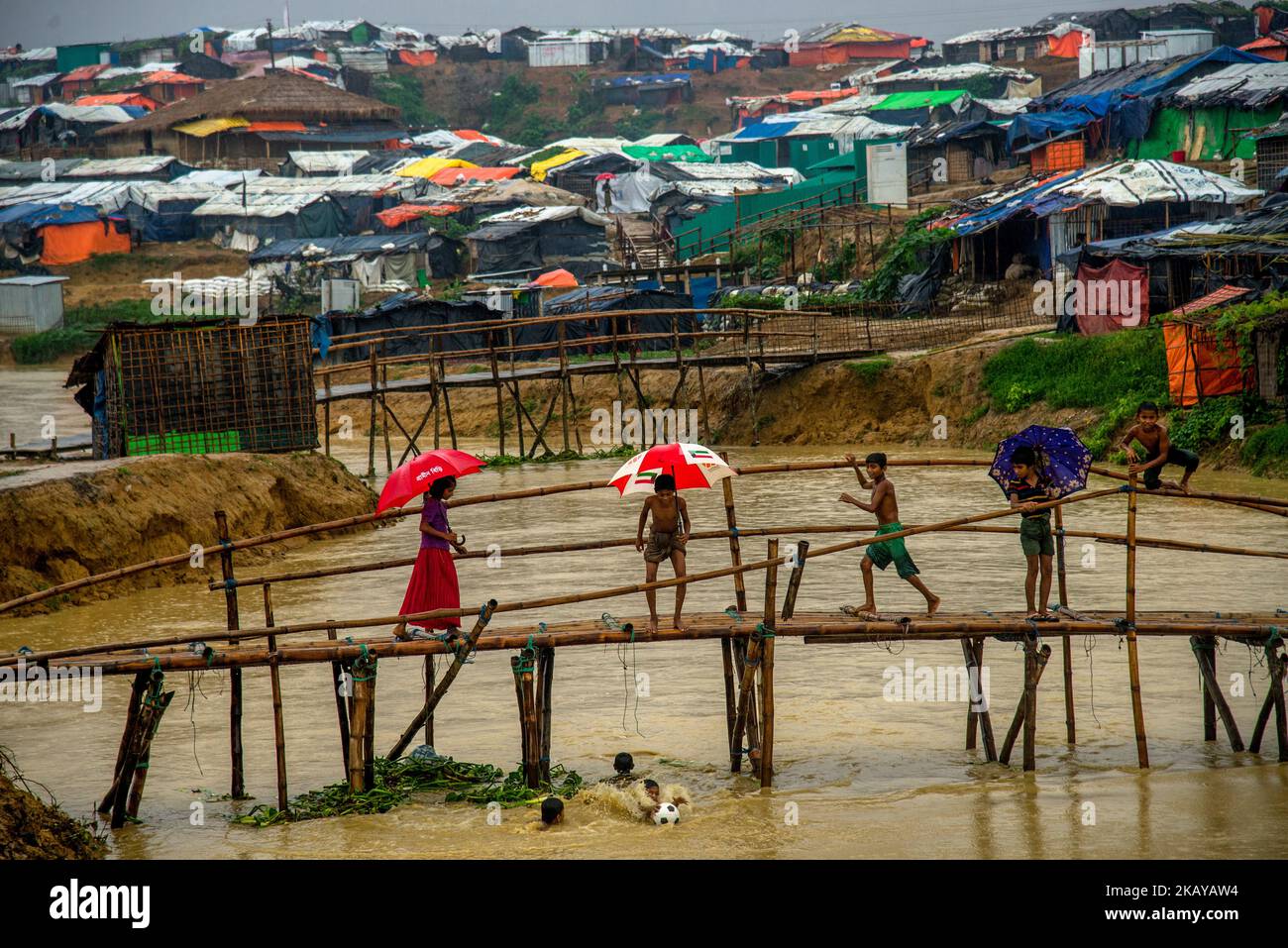 Children playing in rain monsoon hi-res stock photography and images ...