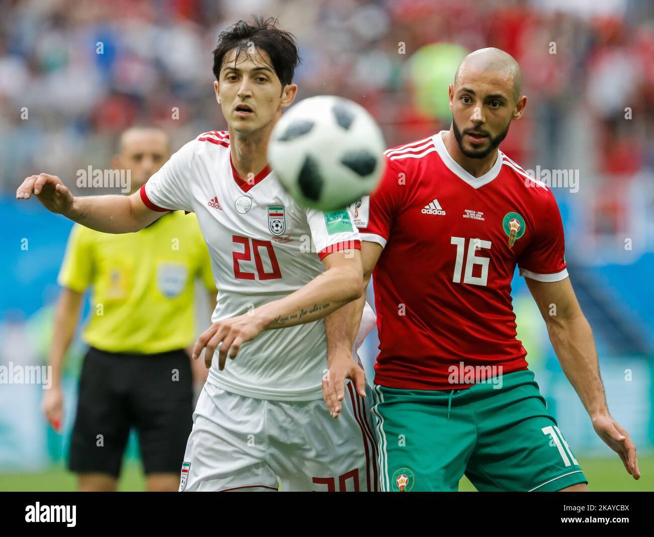 Noureddine Amrabat (R) of Morocco national team and Sardar Azmoun of IR ...