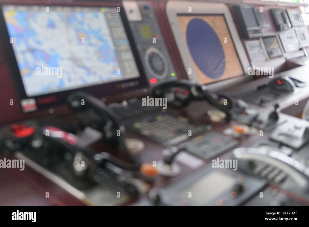Navigational control panel and VHF radio. Working on the ship's ...