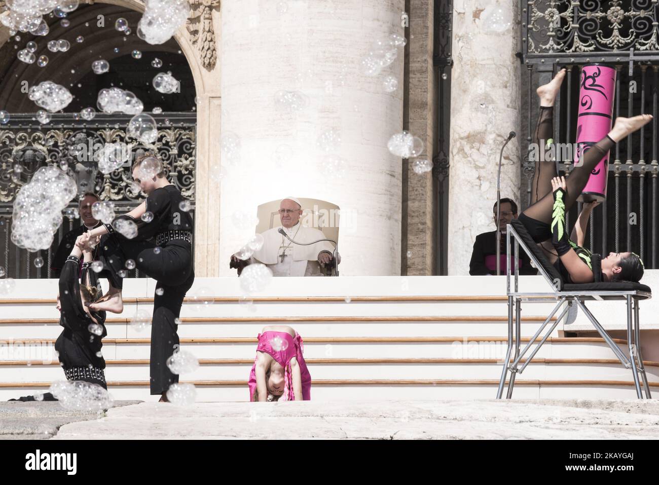 Pope Francis observes the spectacle of the aquatic circus, during the ...