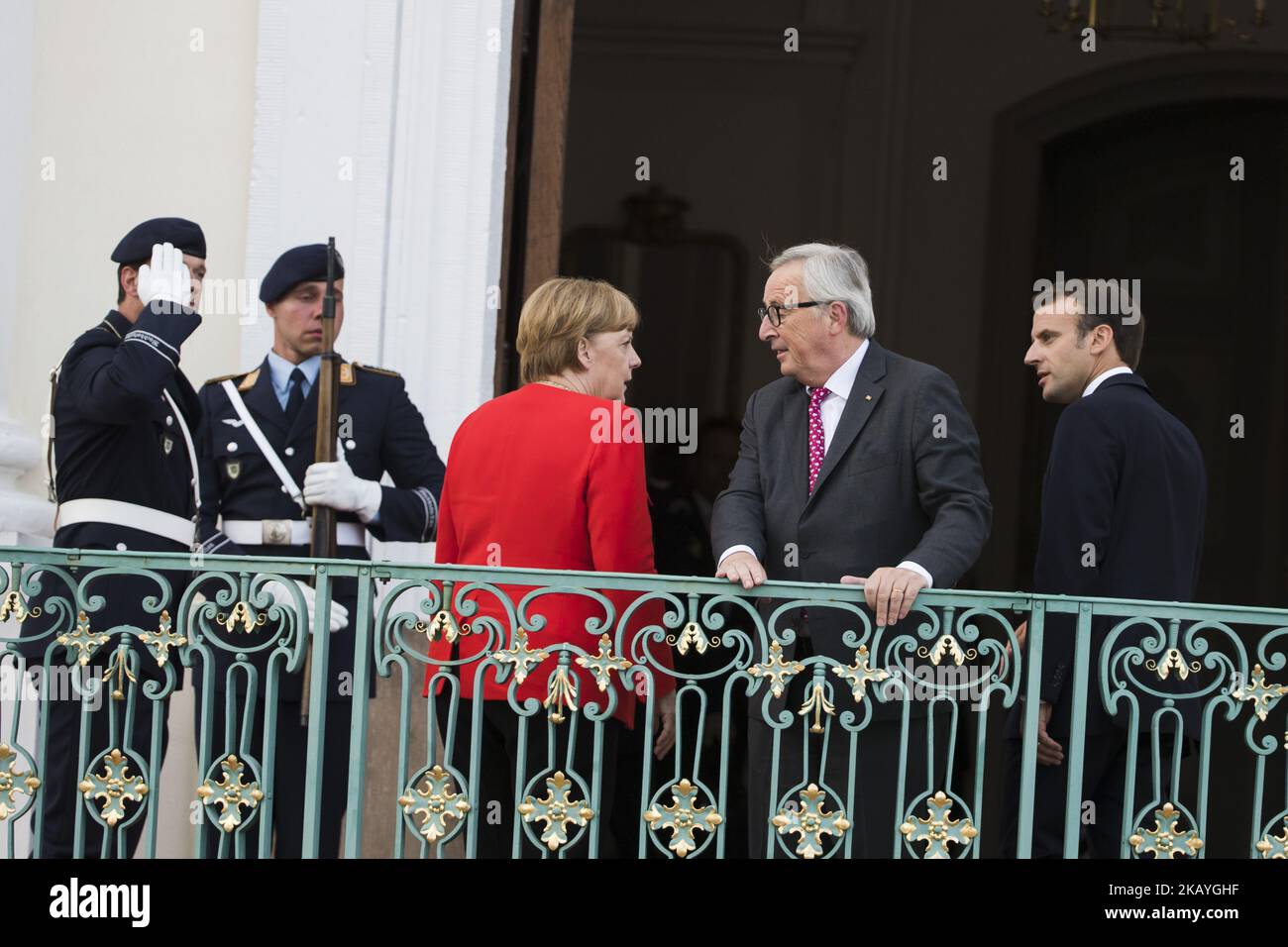 German Chancellor Angela Merkel (3L), French President Emmanuel Macron ...