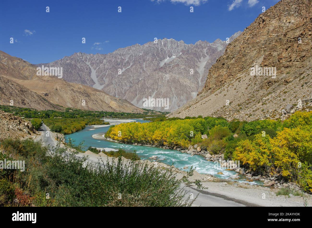 Colorful autumn mountain landscape in Gunt river valley with turquoise ...