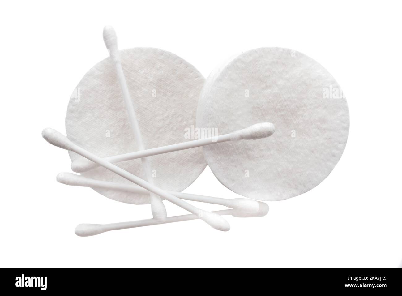 Cotton pads and ear sticks on a white background close-up. Cotton wool ...