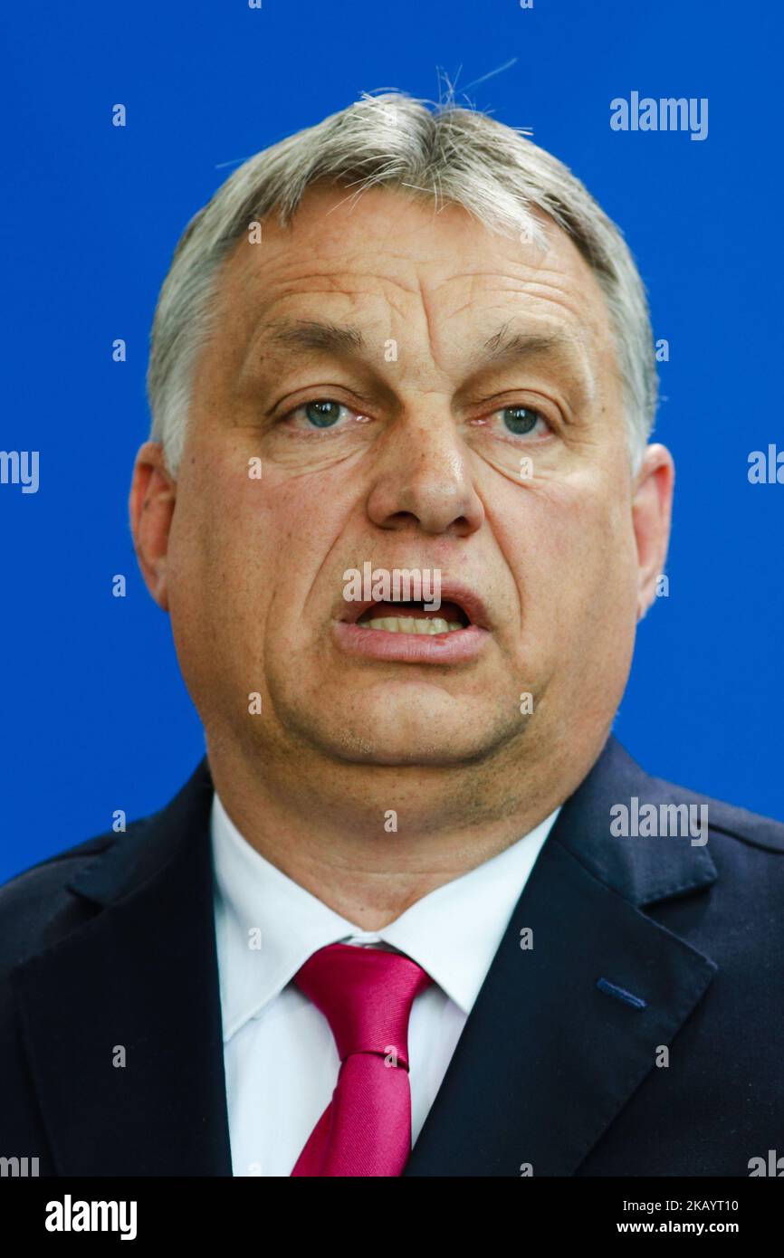 Hungarian Prime Minister Victor Urban reacts while speaking to the ...