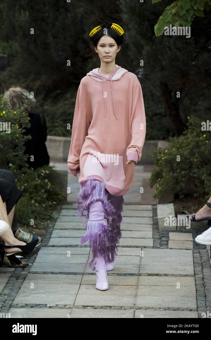 A model runs the runway during the Marcel Ostertag fashion show during ...