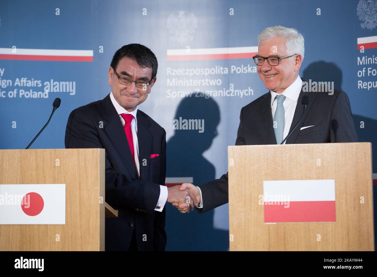 Japanese Foreign Minister Taro Kono (L) handshake with Polish Foreign ...