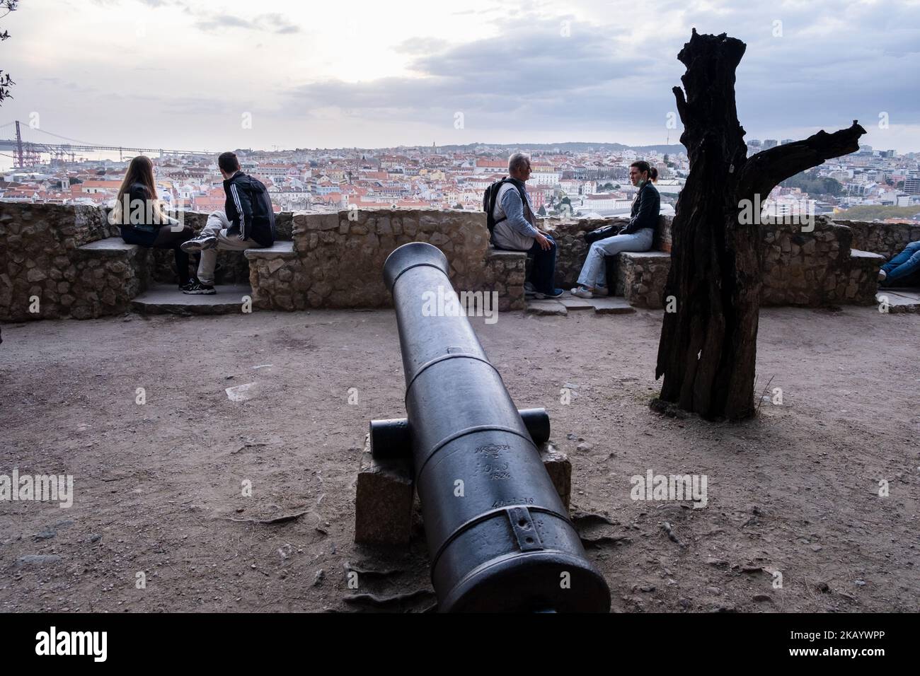 SAT ON CASTLE WALLS, HIGH OVER LISBON: Tourists at Castelo de S. Jorge ...