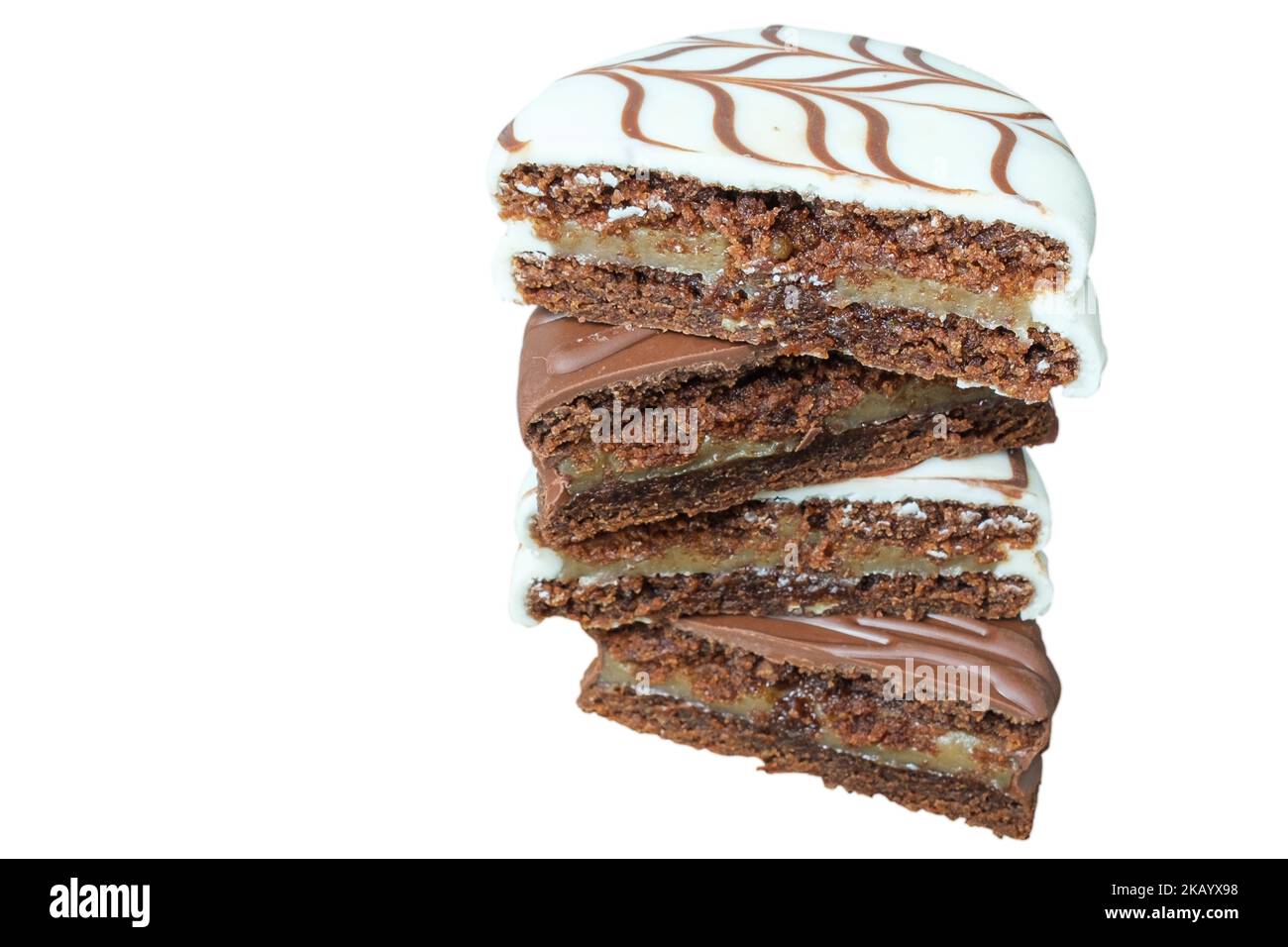 Several stacked Brazilian honey cakes, covered in white chocolate and ...