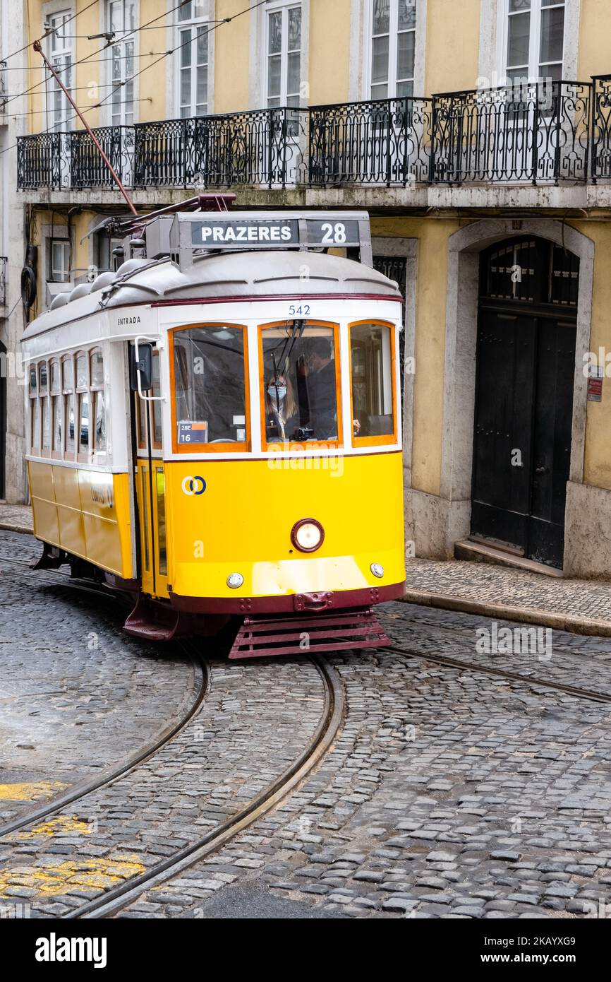 YELLOW TRAM, CORNER, TURNING: The world famous trams in Lisbon ...