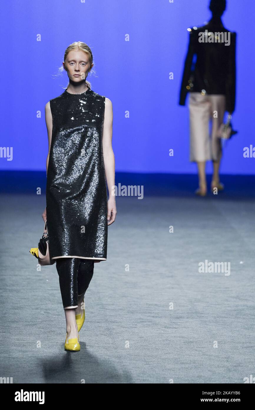 A model presents a creation by Spanish Devota and Lomba at the fashion ...