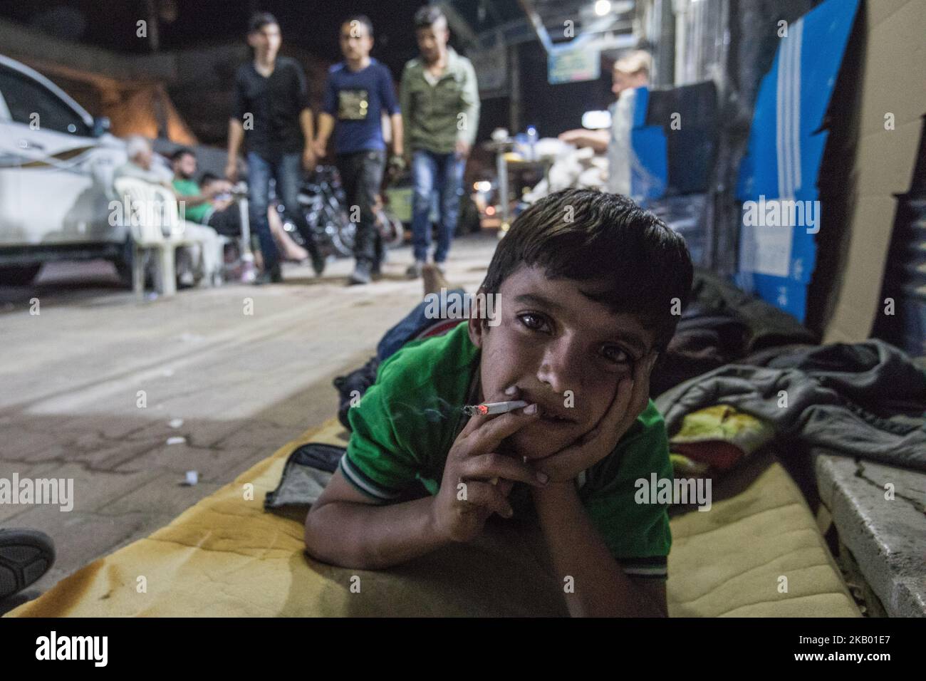 A homeless boy at his sleeping place on a street in Qamishli / Syria ...