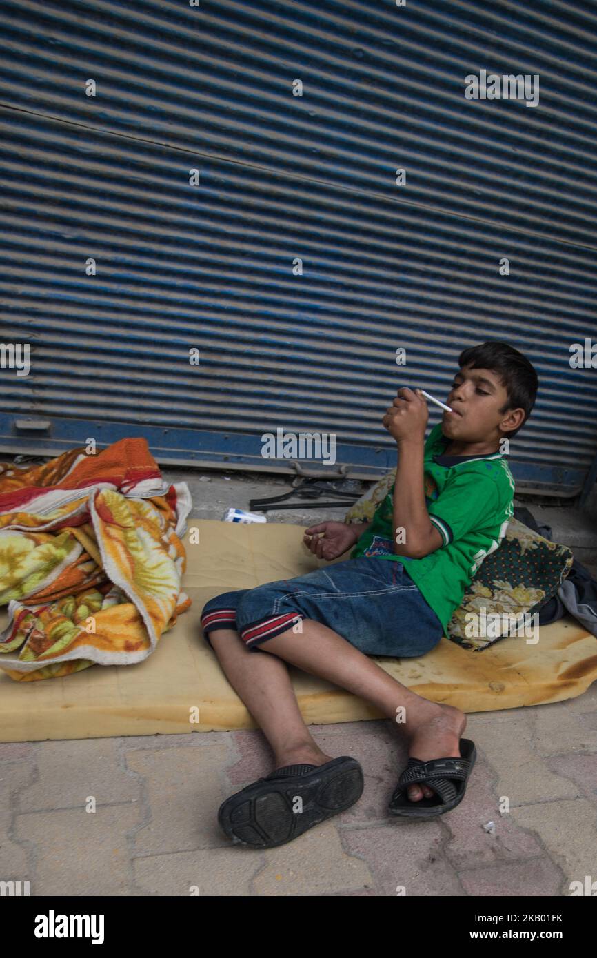 A homeless boy at his sleeping place on a street in Qamishli / Syria ...