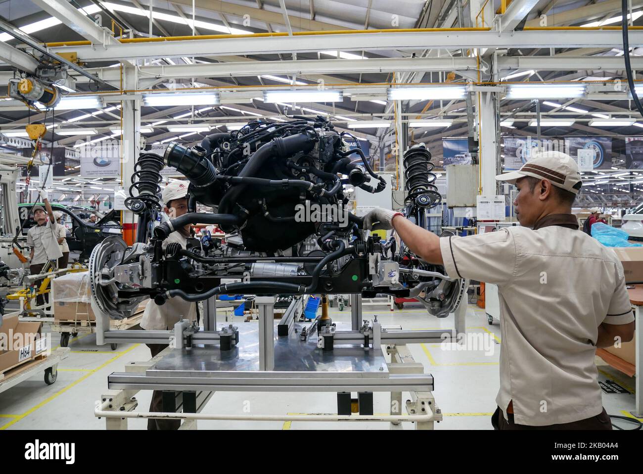 Workers assembly BMW X3 at PT Gaya Motor manufacture in Jakarta ...