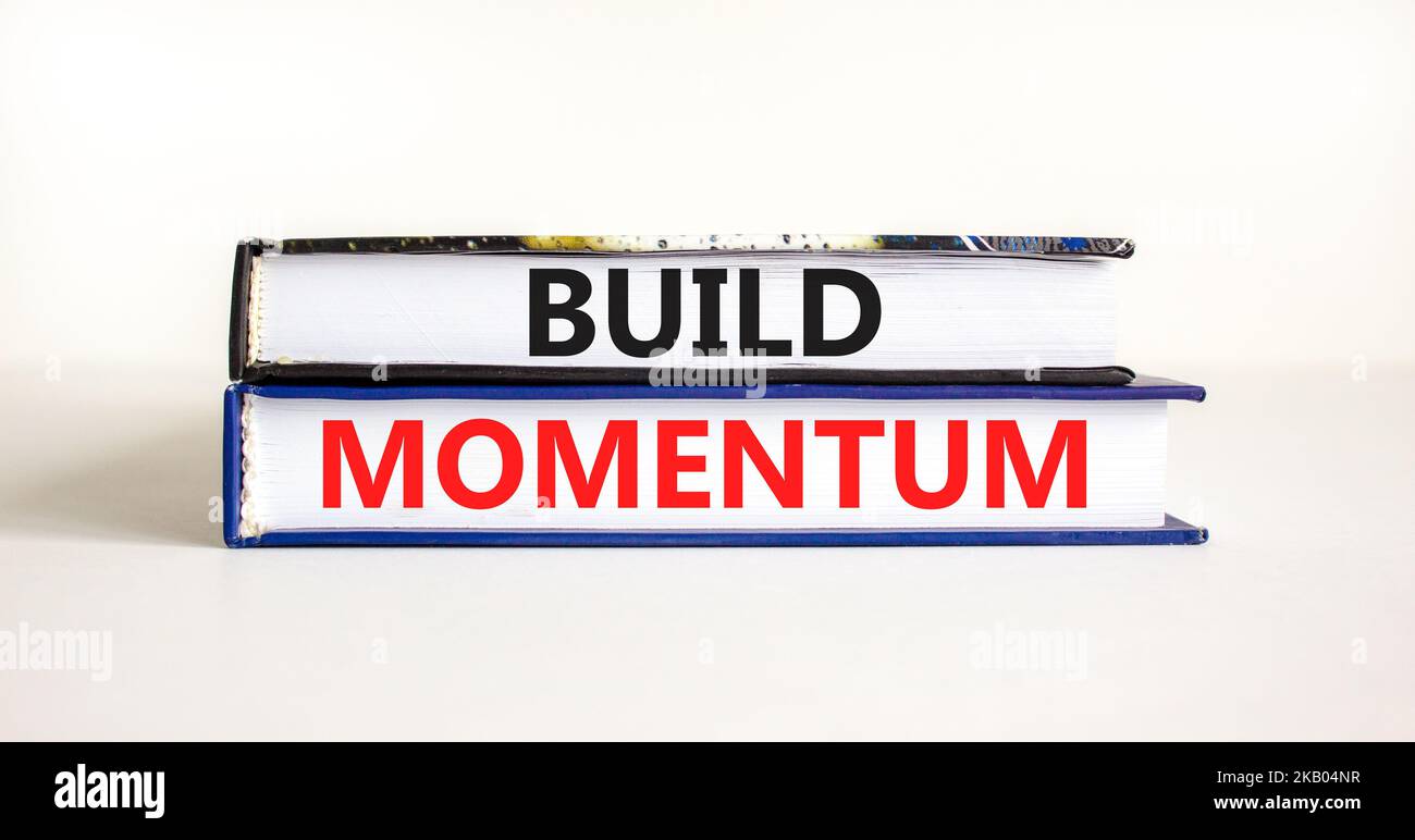Build momentum symbol. Concept words Build momentum on books. Beautiful ...