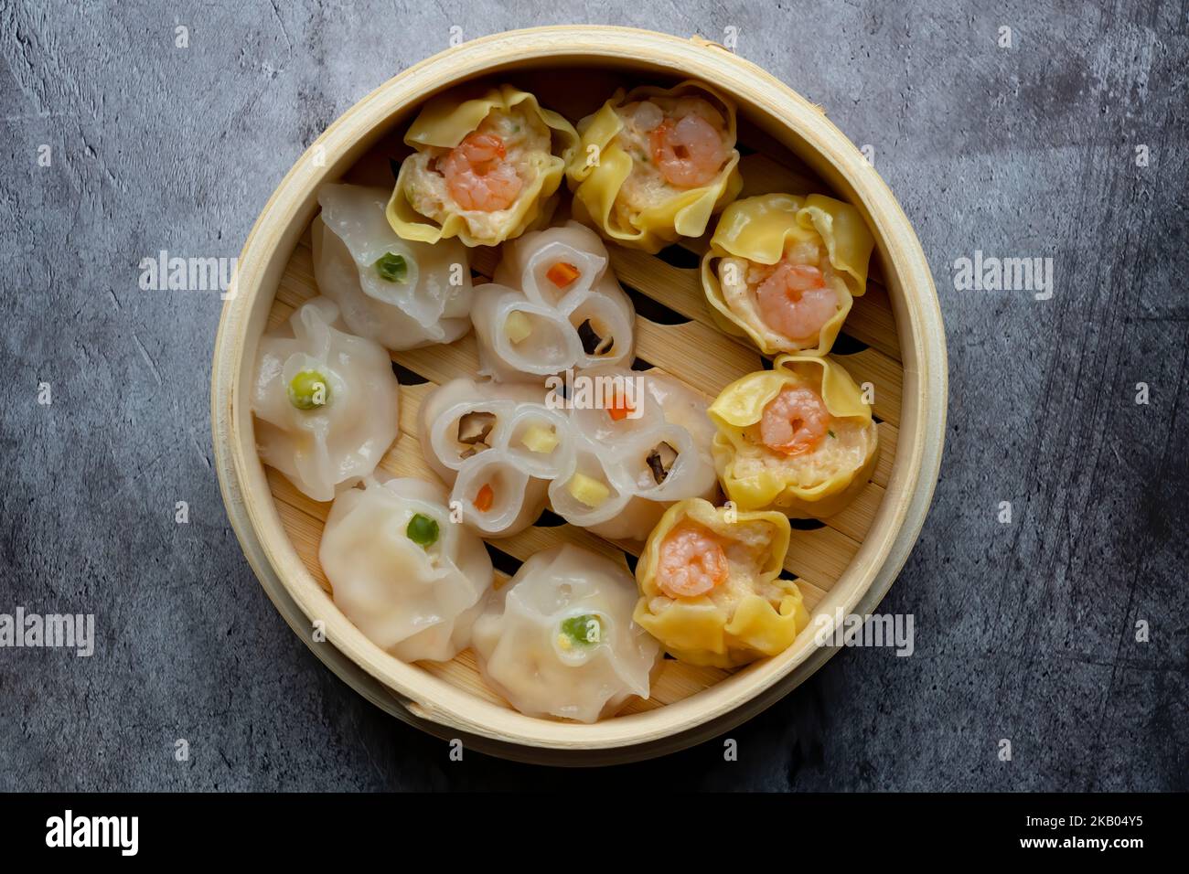 Dim Sum mix steamed in bamboo wood basket.large range of small Chinese ...