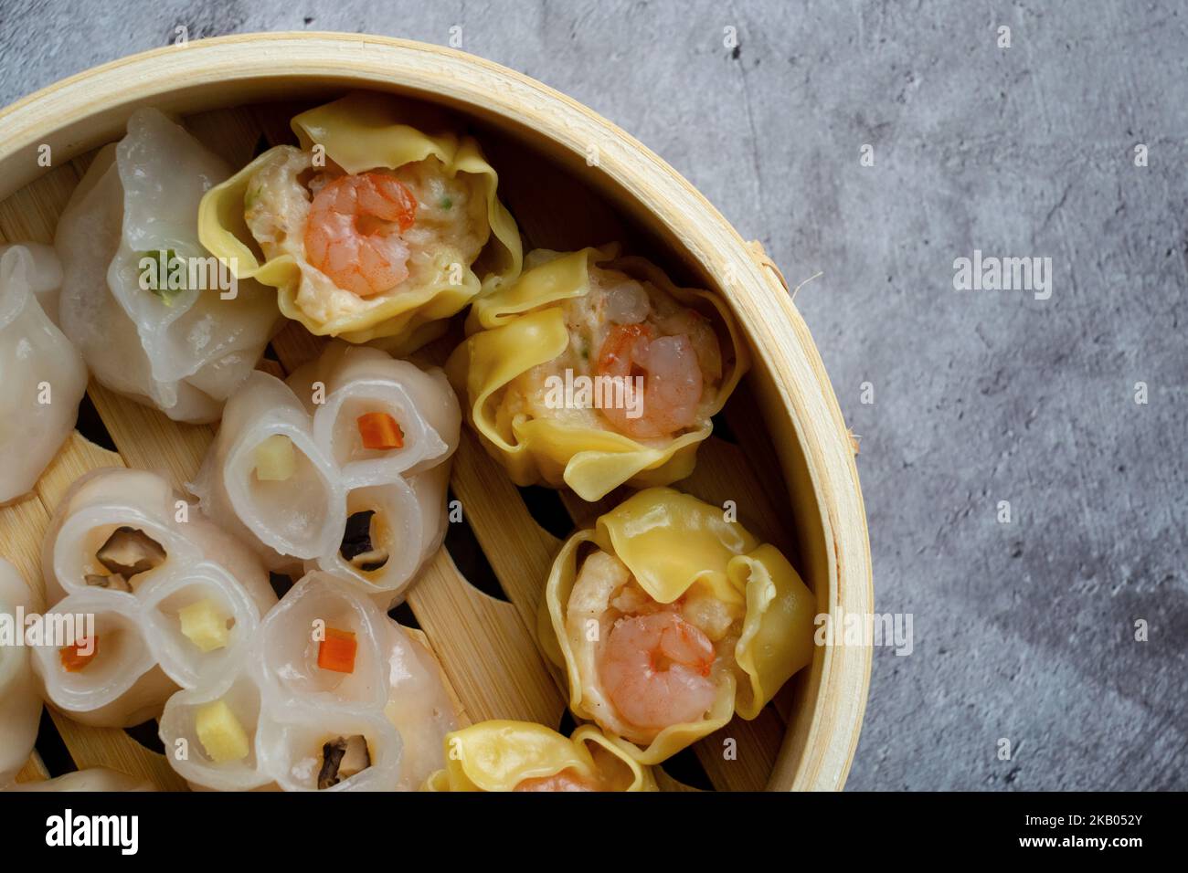 Dim Sum mix steamed in bamboo wood basket.large range of small Chinese ...