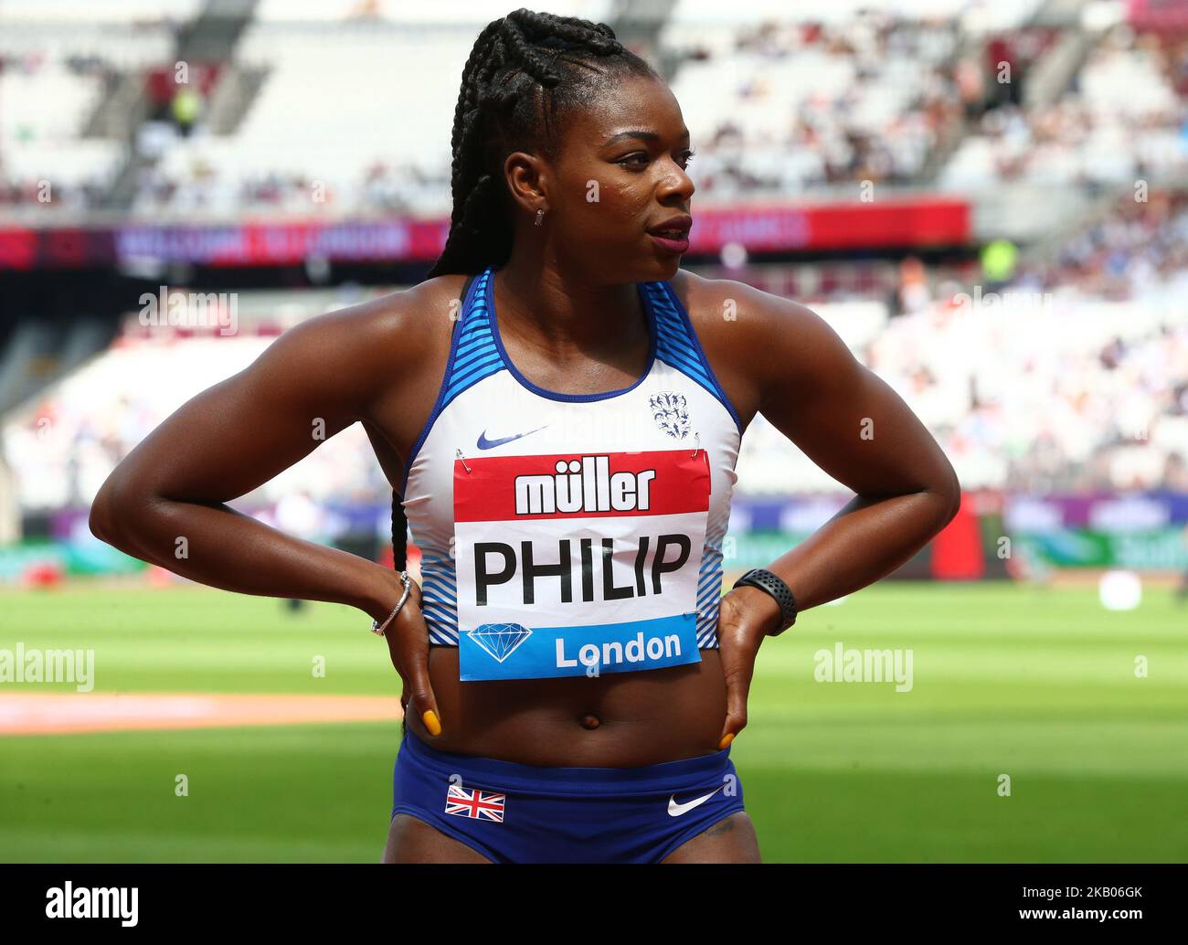Asha Philip of Great Britain and Northern Ireland compete in the 100m ...