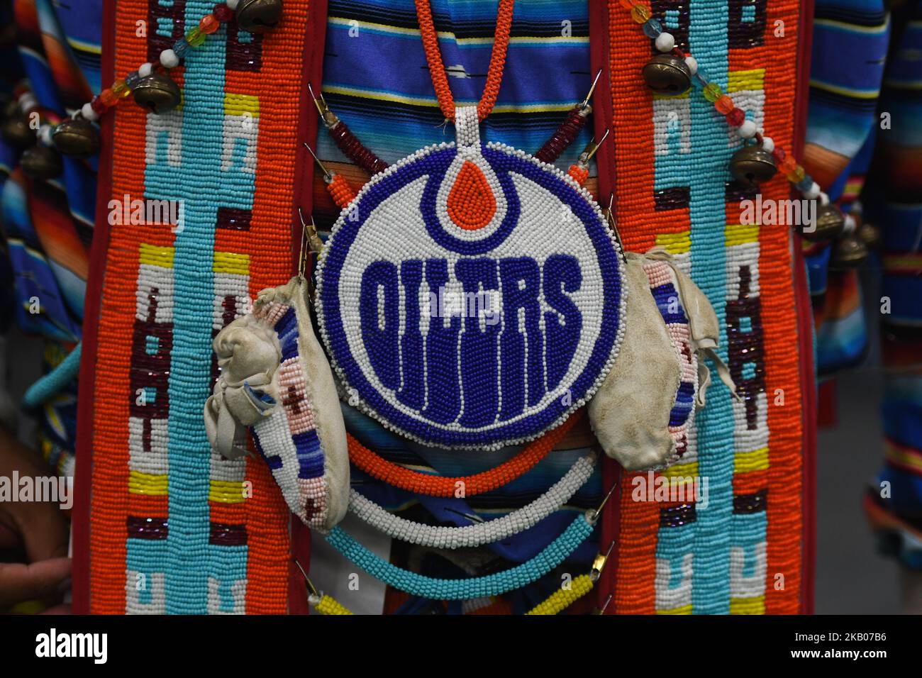 A member of the First Nations seen with a hand made Edmonton Oilers ...