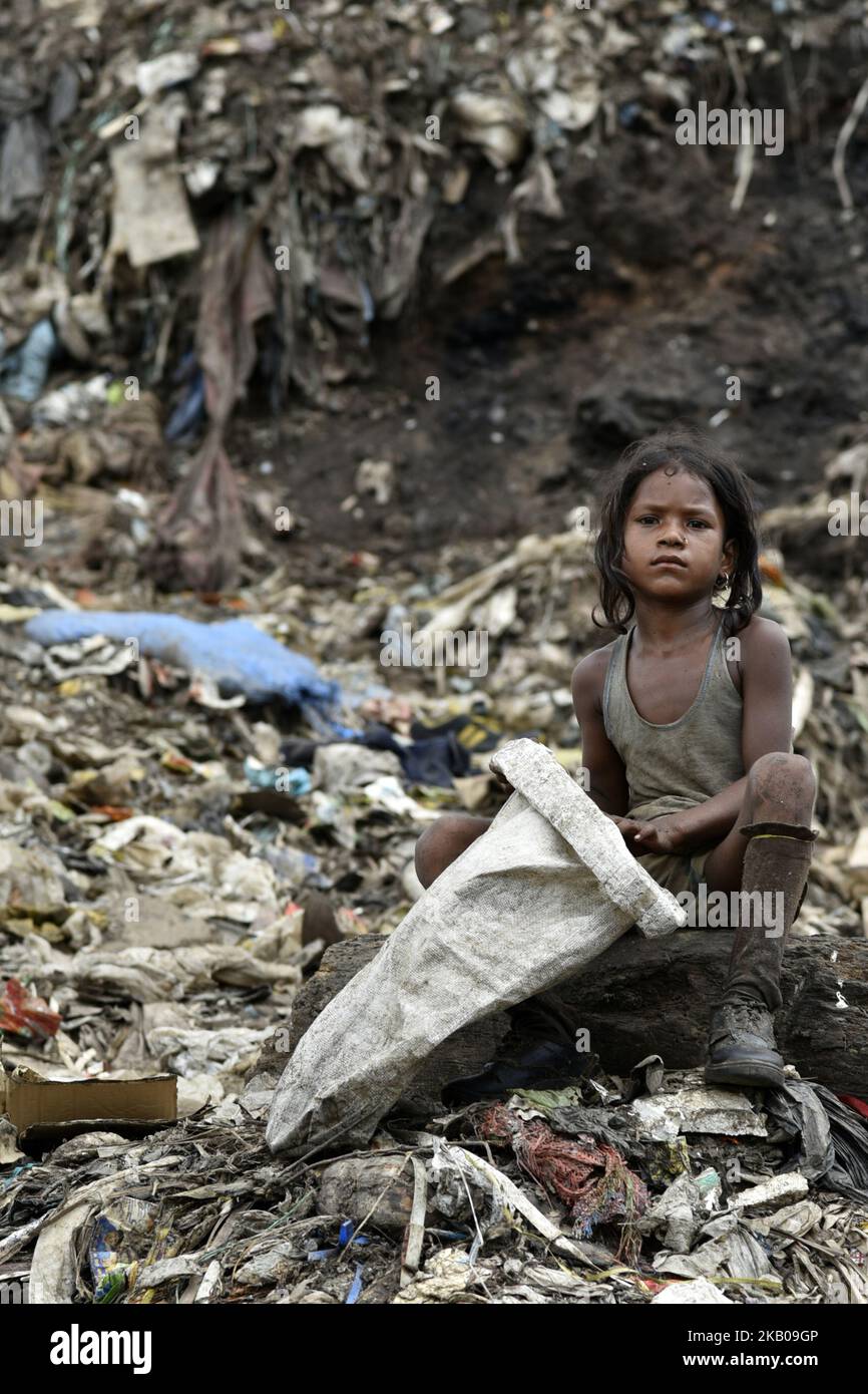 A child ragpicker at one of the largest disposal sites in the north ...