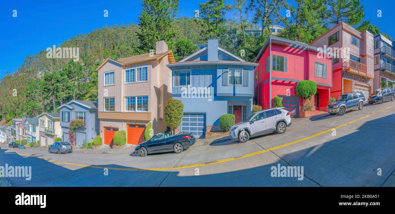 Panorama of homes on a steep street in San Francisco Califronia on a ...