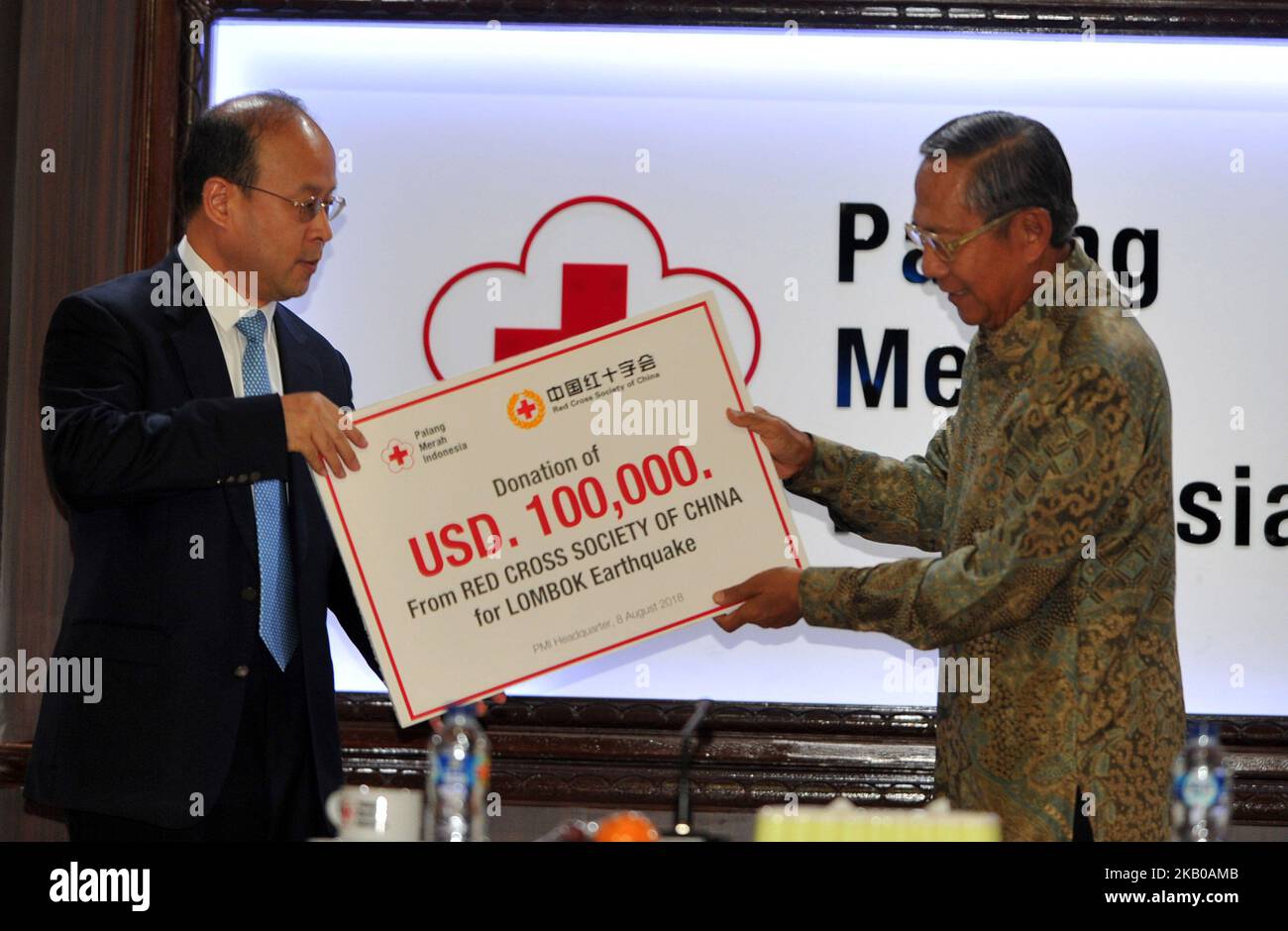 Donation handover hi-res stock photography and images - Alamy