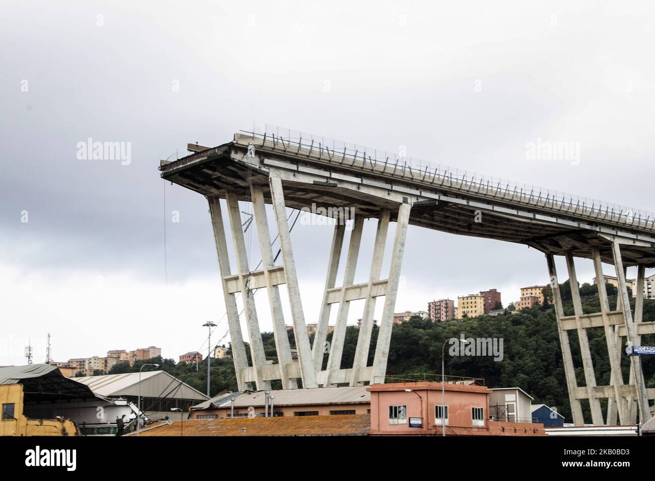 A picture taken on August 14, 2018 shows vehicles standing on a part of ...