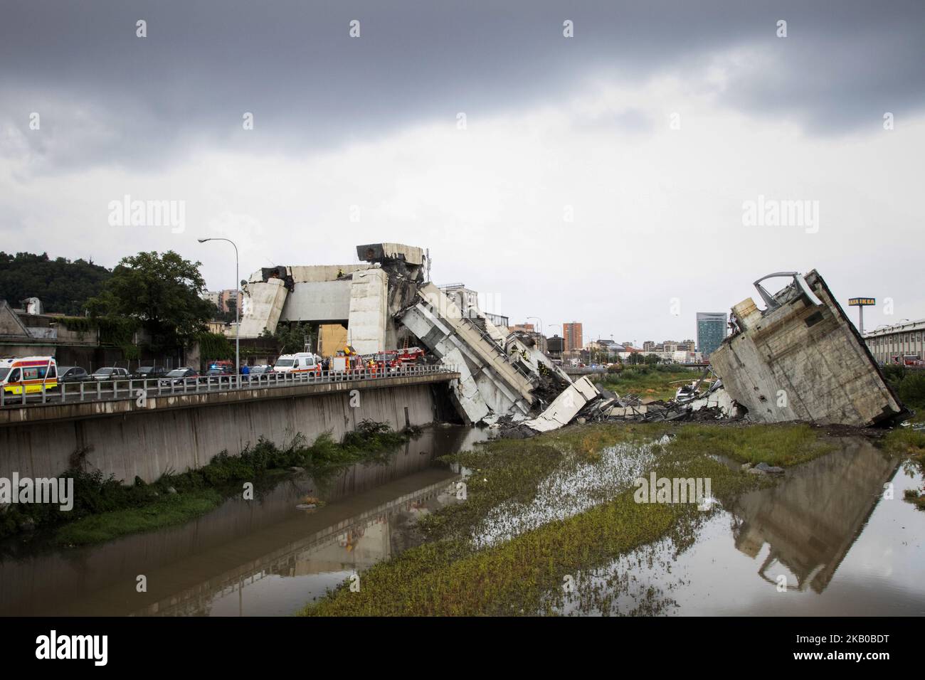 A picture taken on August 14, 2018 shows vehicles standing on a part of ...