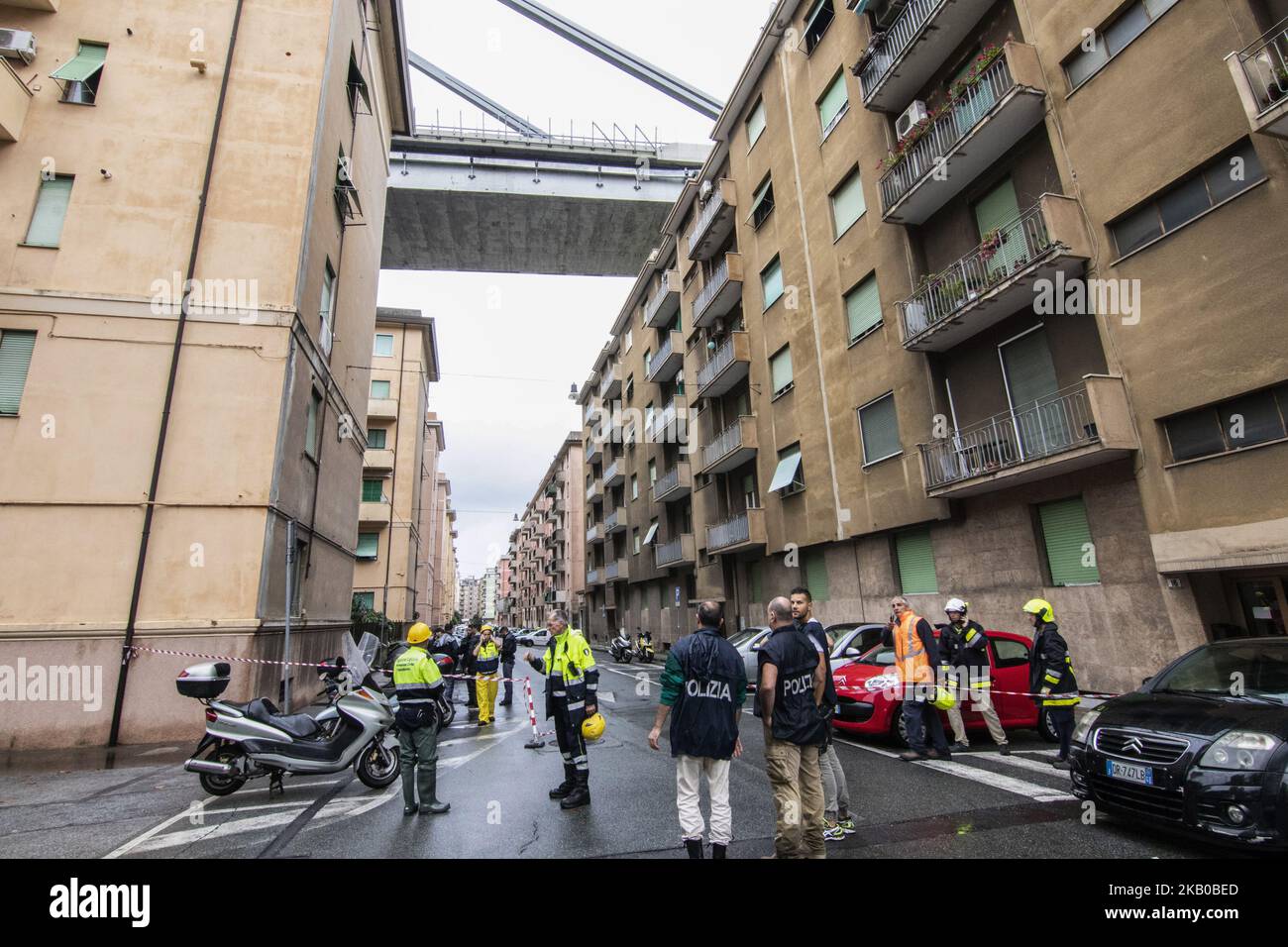 A picture taken on August 14, 2018 shows vehicles standing on a part of ...