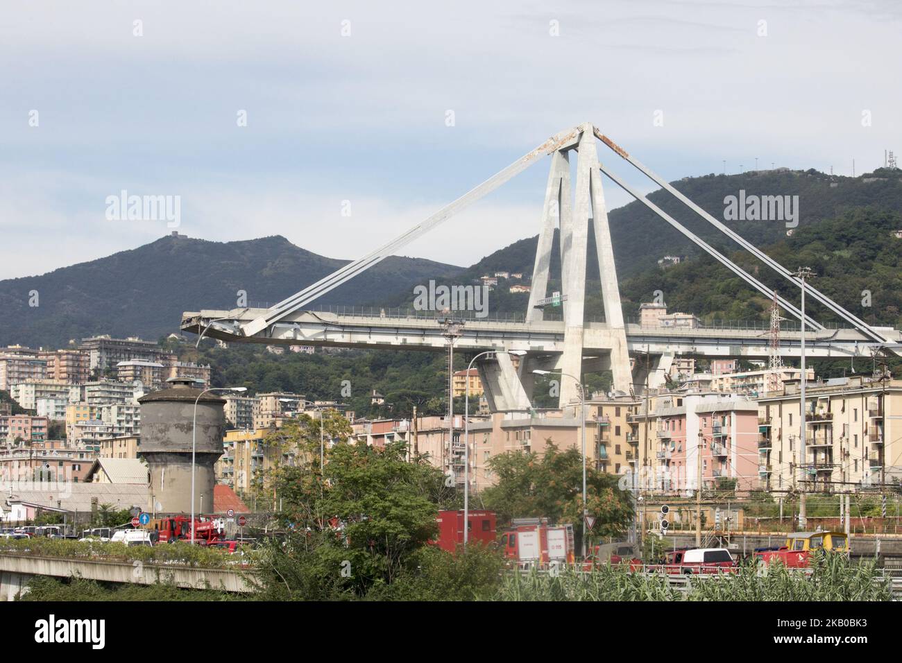 The remains of the Morandi motorway bridge stands after it partially ...