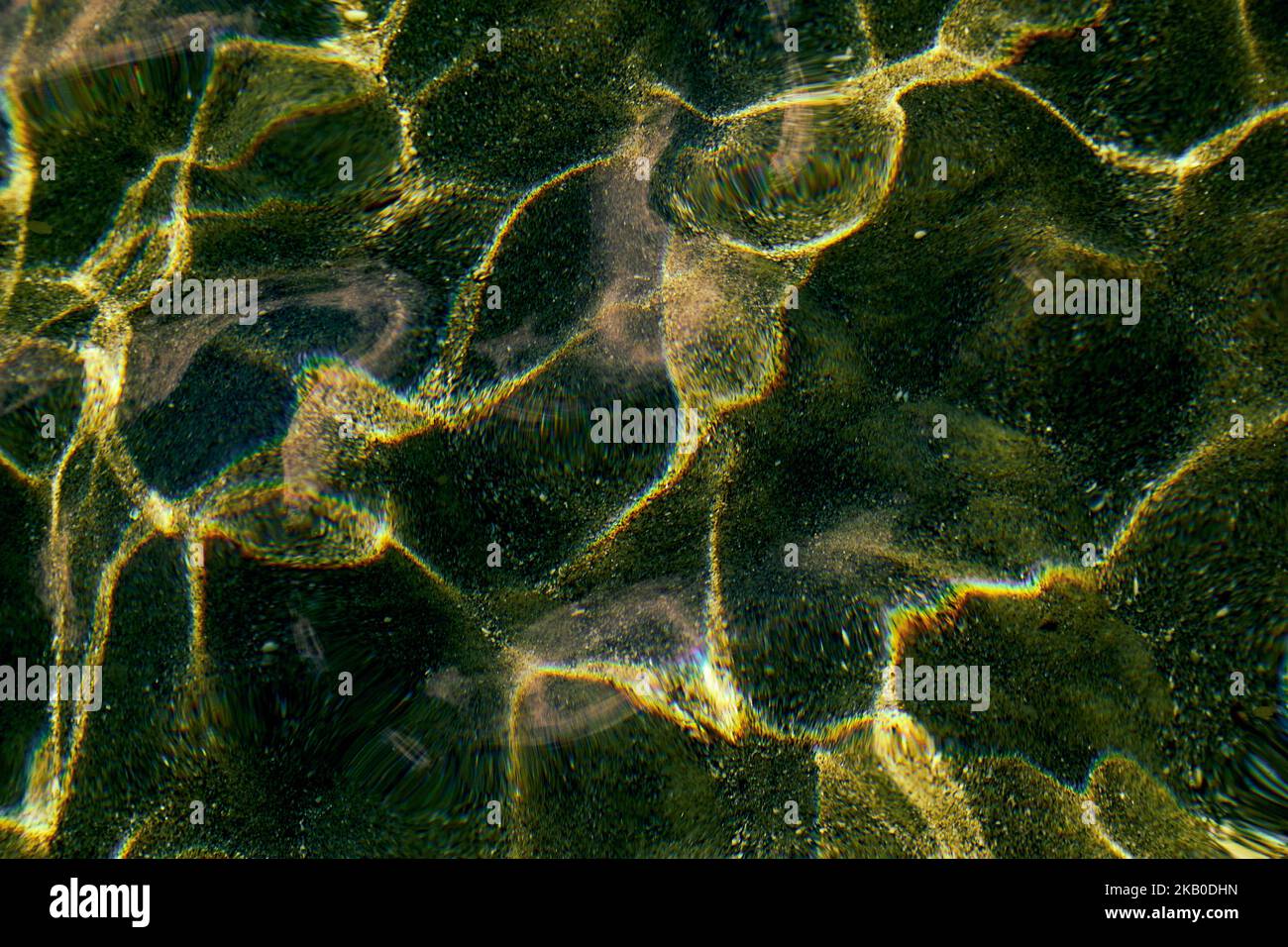 Reflection on the seabed of the refraction of the sun's rays in sea ...