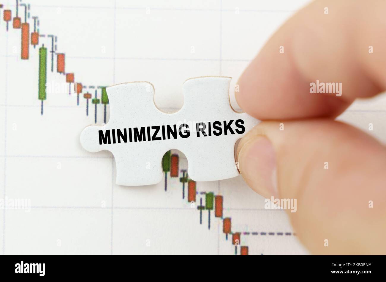 Business concept. Against the background of the quotes chart, a puzzle ...