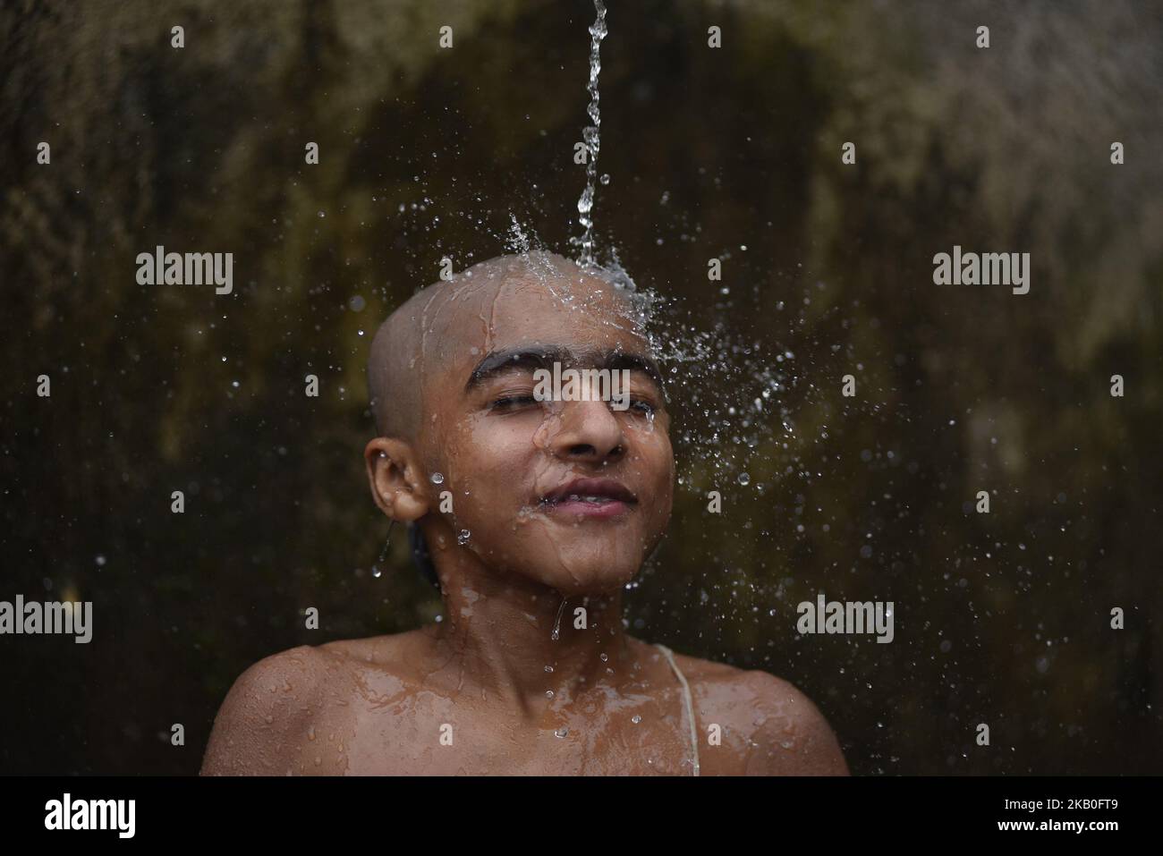 Nepalese kids from Hindu school Bhagwat Sanyaas Aashram Gurukul taking ...