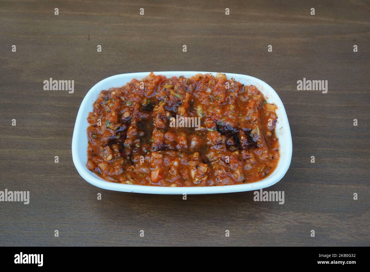 Hot Ezme Salad on a plate, traditional Turkish food Stock Photo - Alamy