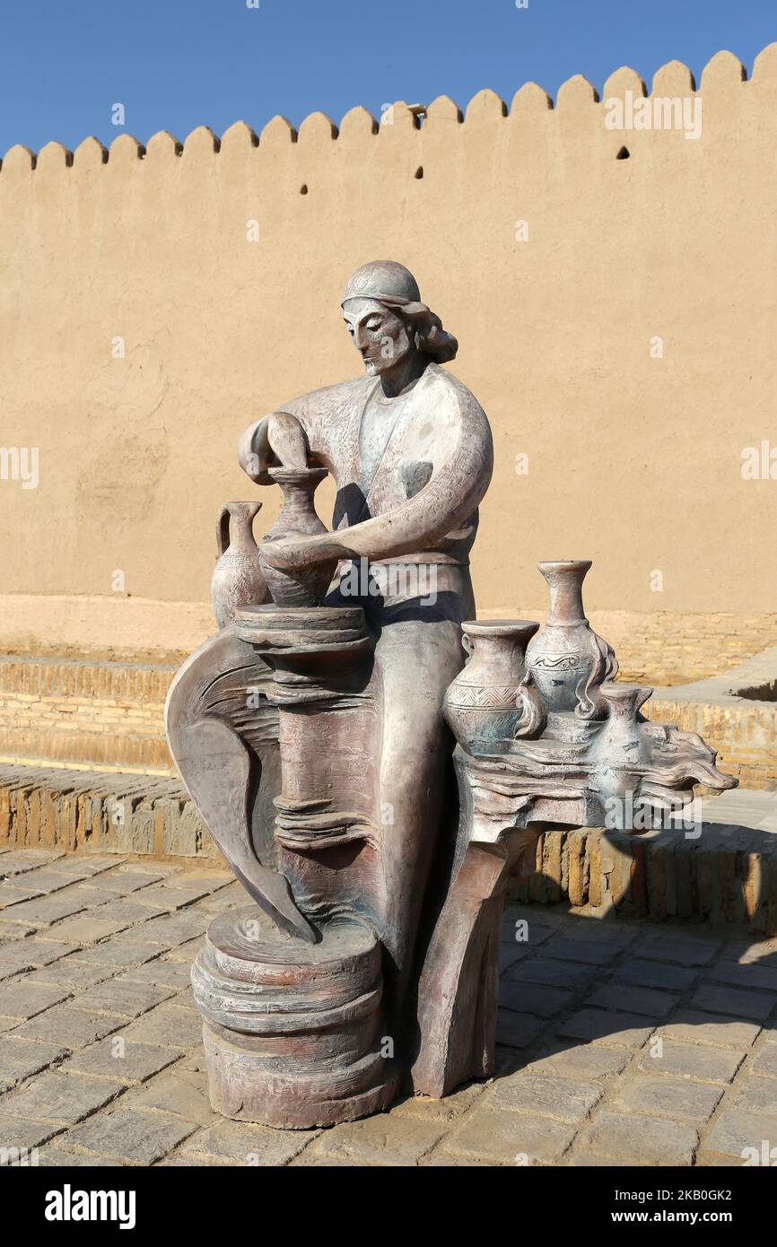 Potter sculpture outside Kunya Ark, Ichan Kala (Inner Fortress), Khiva ...