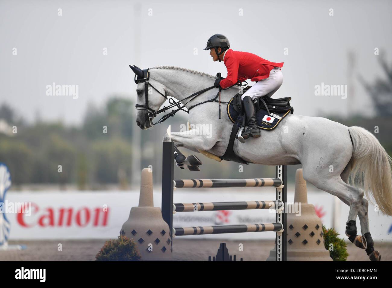 Japan's equestrian competes for qualification in the jumping team final ...