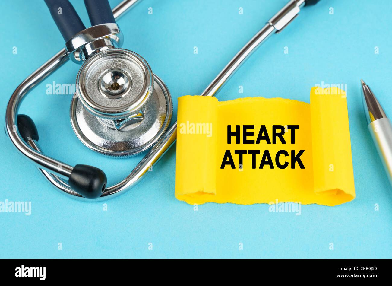 Medical concept. On the blue surface there is a stethoscope, a pen and ...