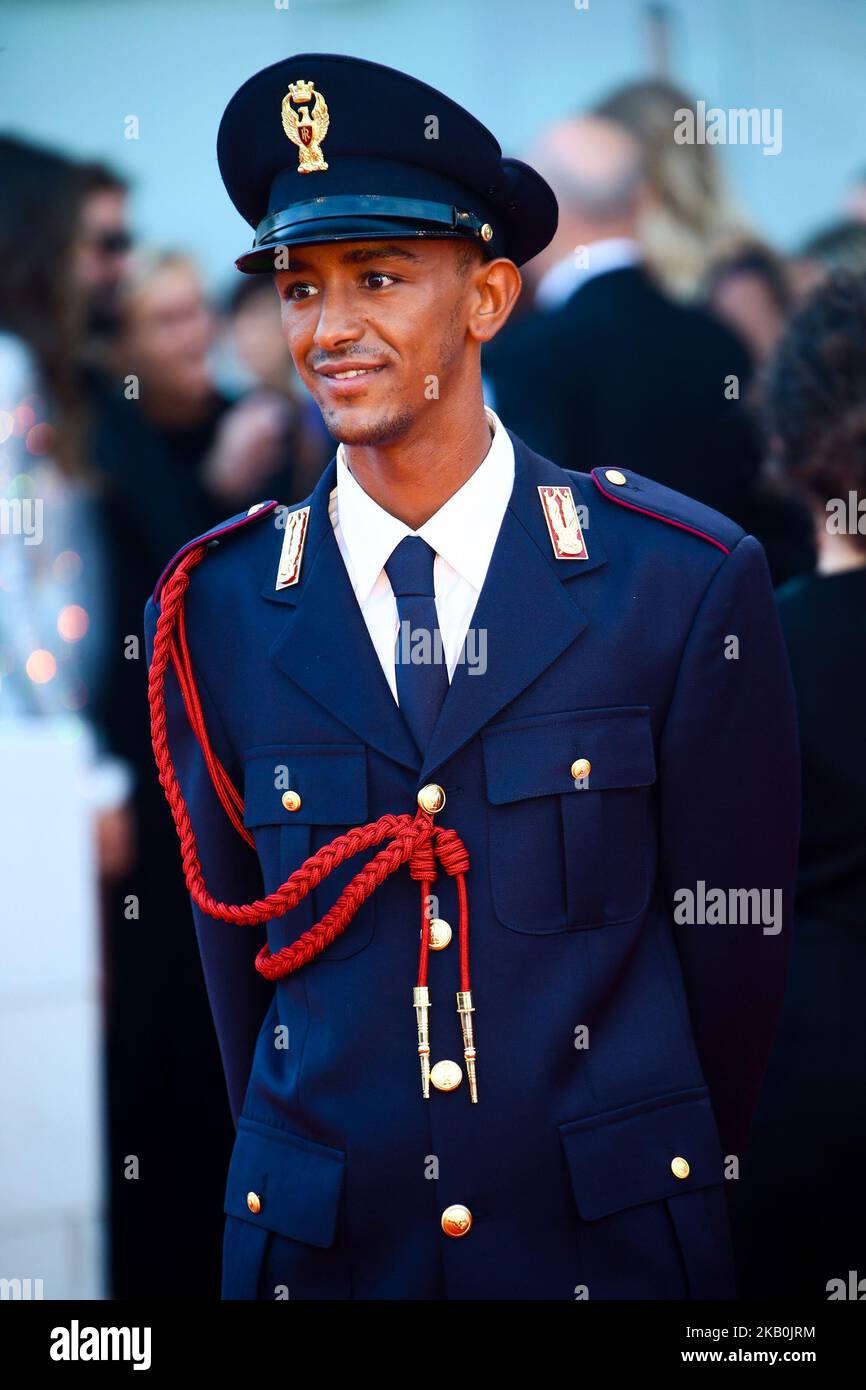 Yemaneberhan Crippa walks the red carpet ahead of the 'Roma' screening ...