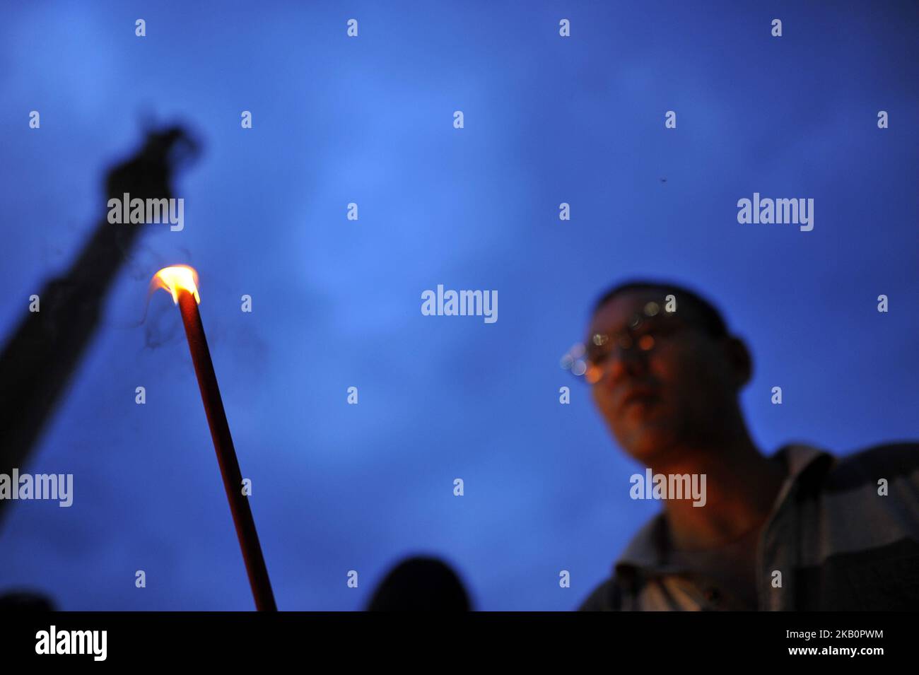 Nepalese Devotees offering fragrances stick towards Lord Bhimsen during ...