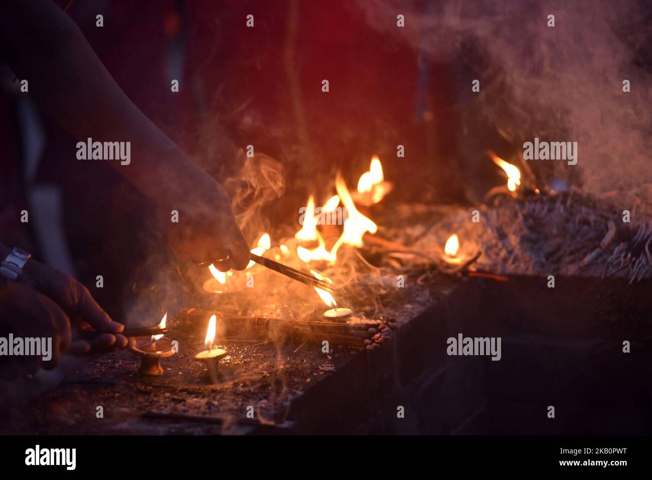 Nepalese Devotees offering fragrances stick towards Lord Bhimsen during ...