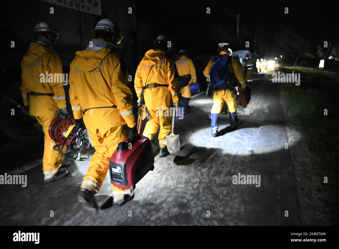 Photo taken on September 7, 2018 shows a firefighters during rescue ...