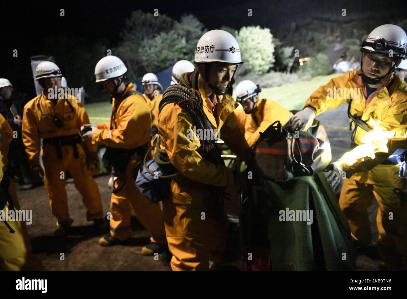 Photo taken on September 7, 2018 shows a firefighters during rescue ...