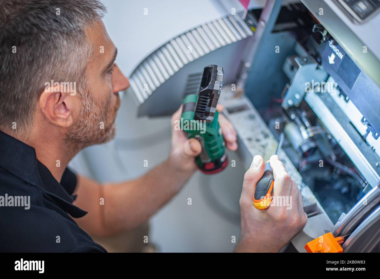 All machines nead maintains. Professional technician troubleshooting ...