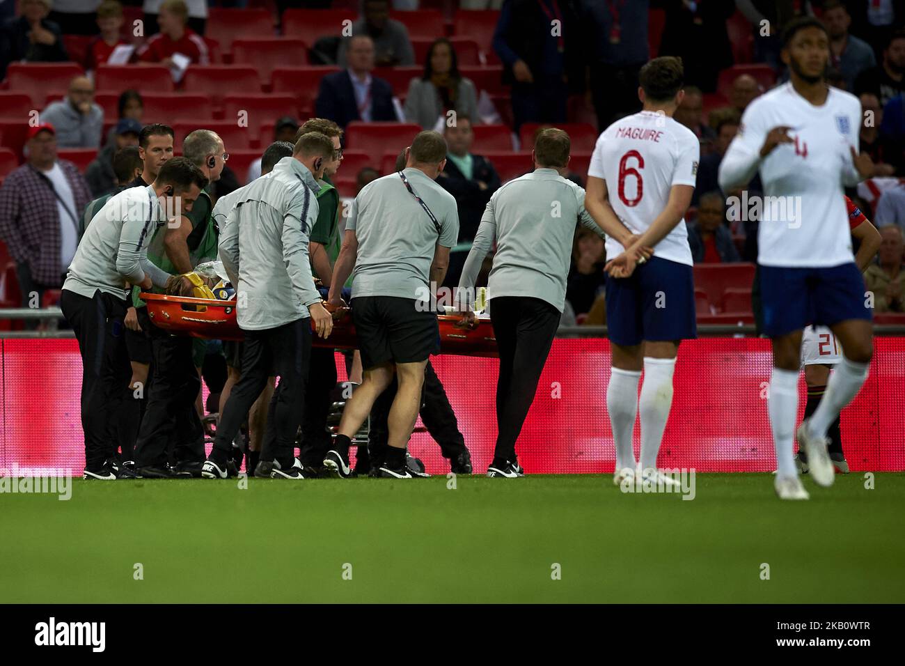 Luke Shaw of England is stretchered from the pitch following injury ... Luke Shaw of England is stretchered from the pitch following injury ...