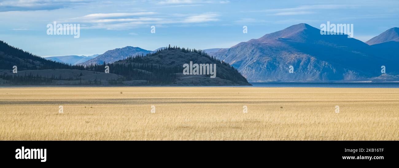 Canada, Yukon, view of the tundra in autumn, with mountains in ...
