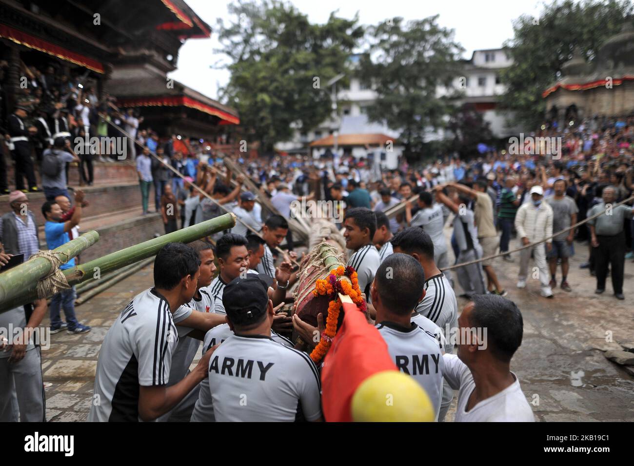 Nepalese devotees pulling rope to erecting the long wooden Log (Yo ...