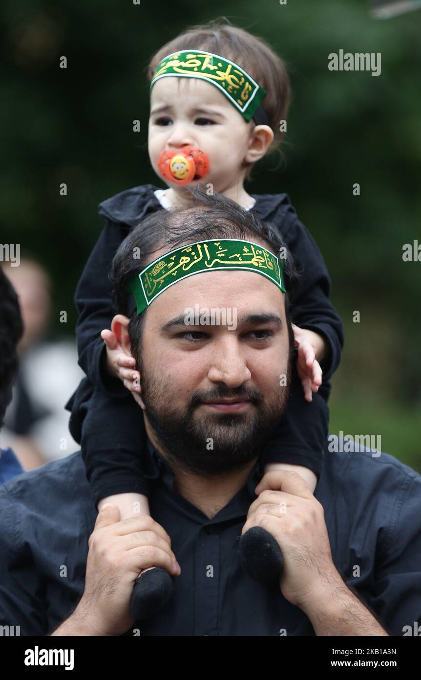 Shiite Muslim mourners take part in a Muharram procession in Toronto ...