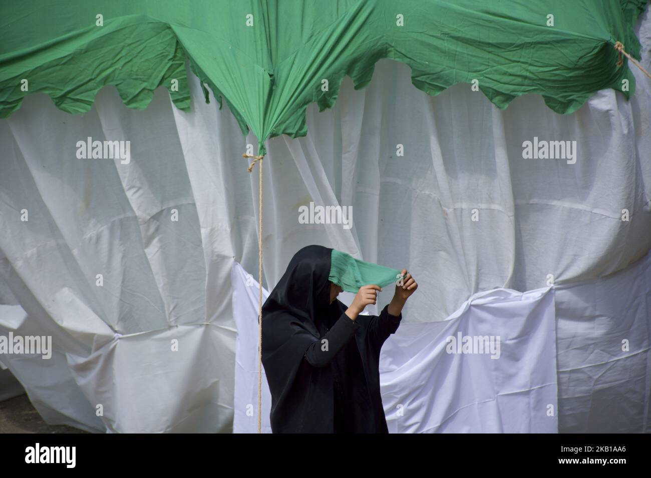 Iranian Shiites in costumes re-enact events of Ashoura in Tehran, Iran ...