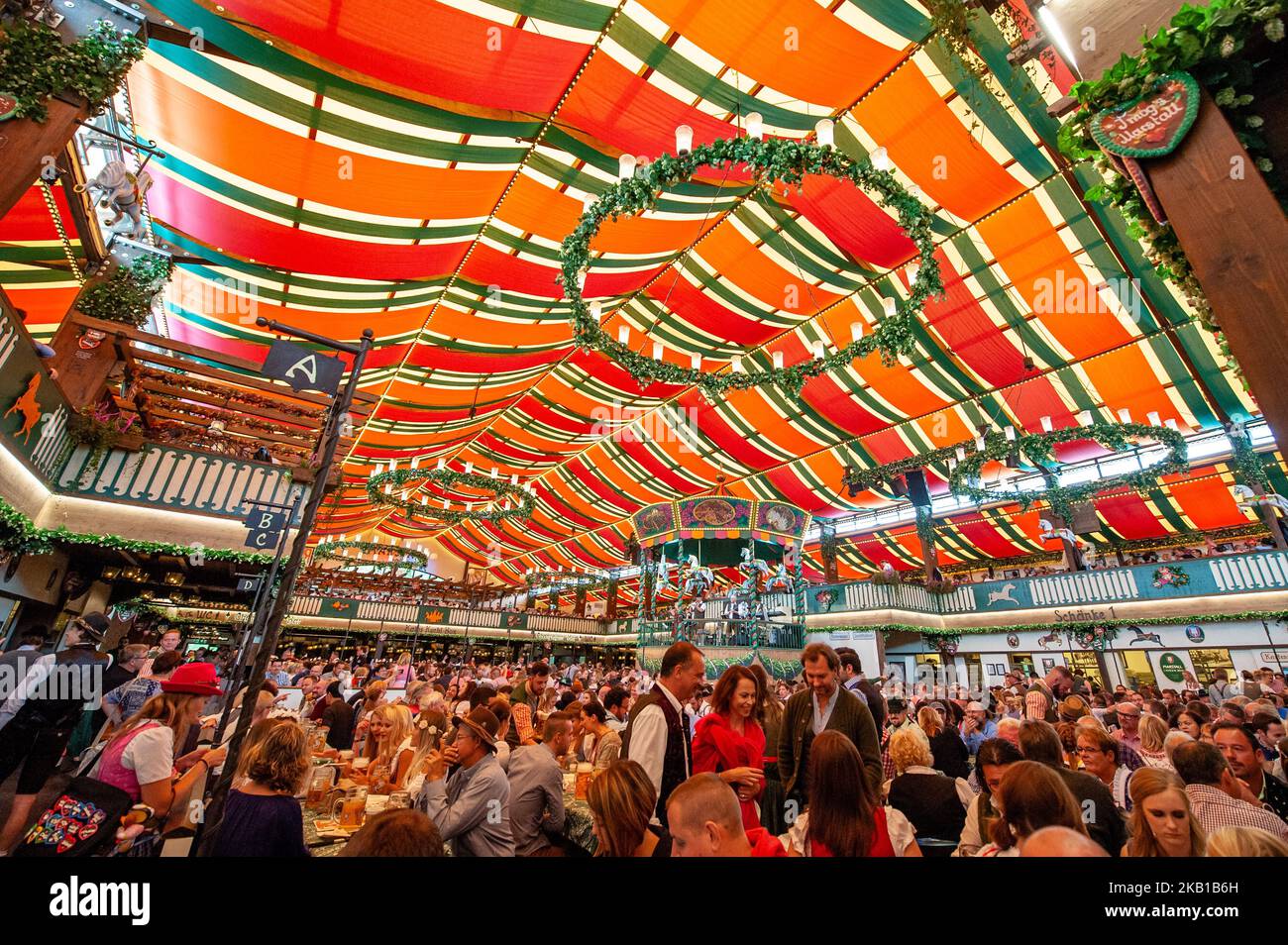 Thousands of visitors rush onto the festival area after the official ...