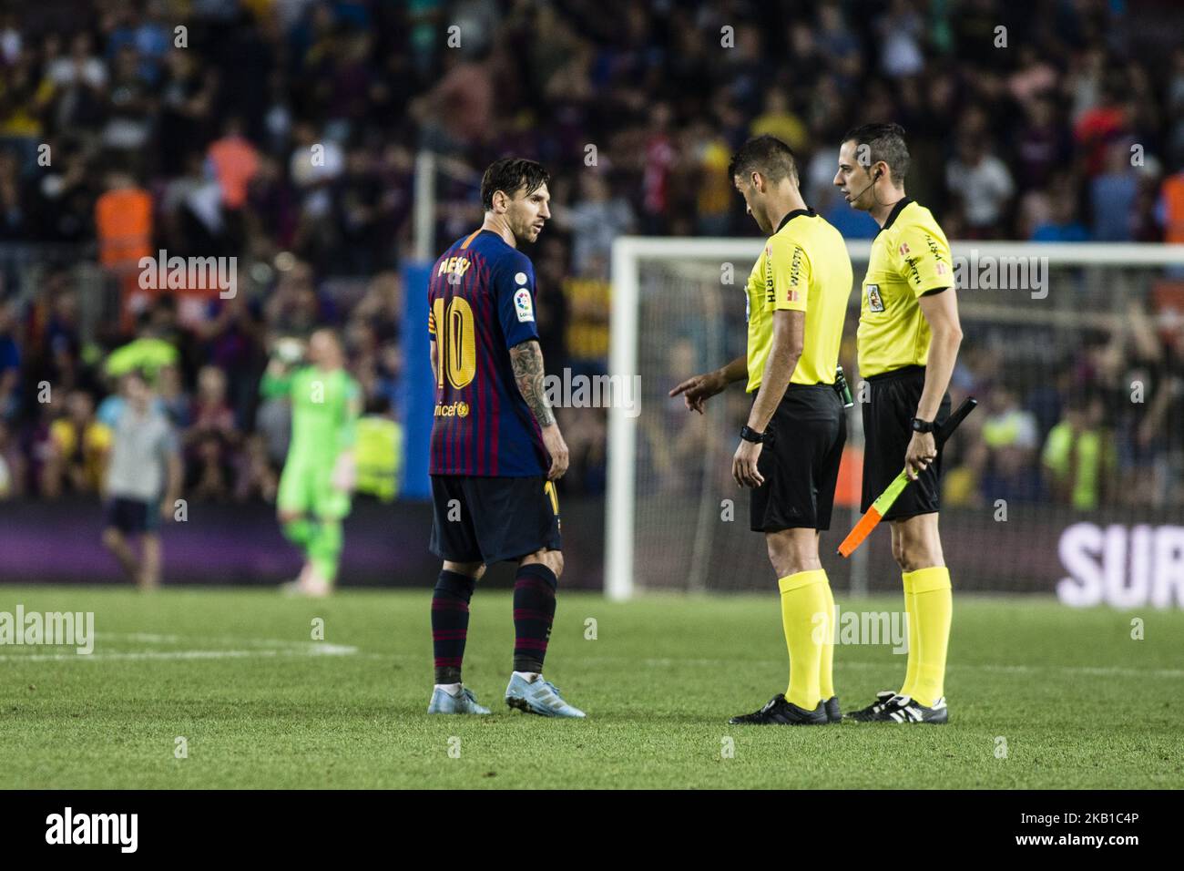 Leo Messi of FC Barcelona arguing with the referee Gil Manzano during ...