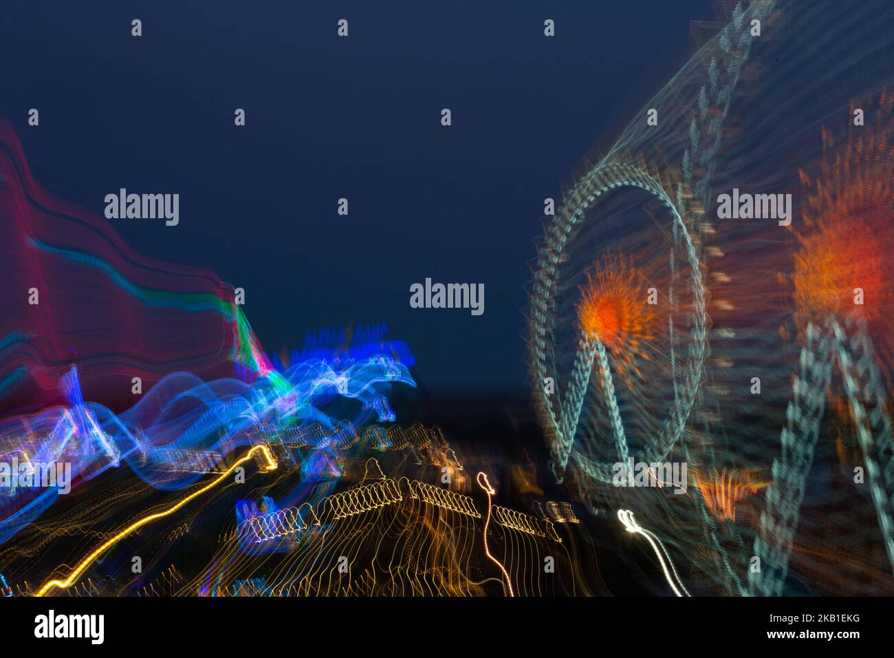 The ferris wheel (Riesenrad) and the roller coaster (Achterbahn) seen ...